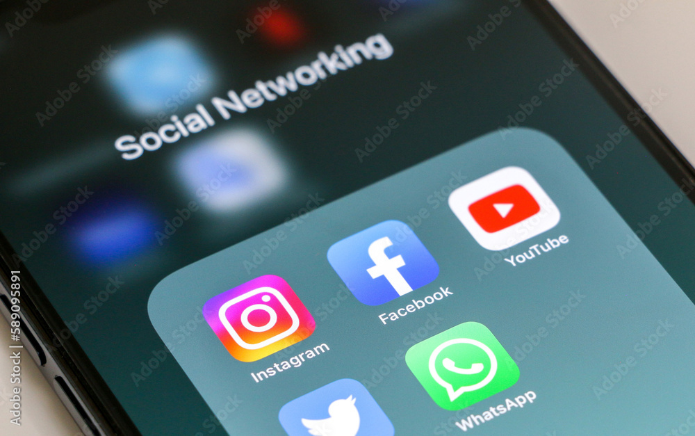 Popular social media and networking app icons shown on smartphone ...