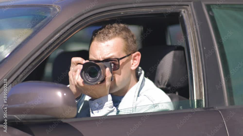 Hidden photographing. Paparazzi Concep Photographer uses his ...