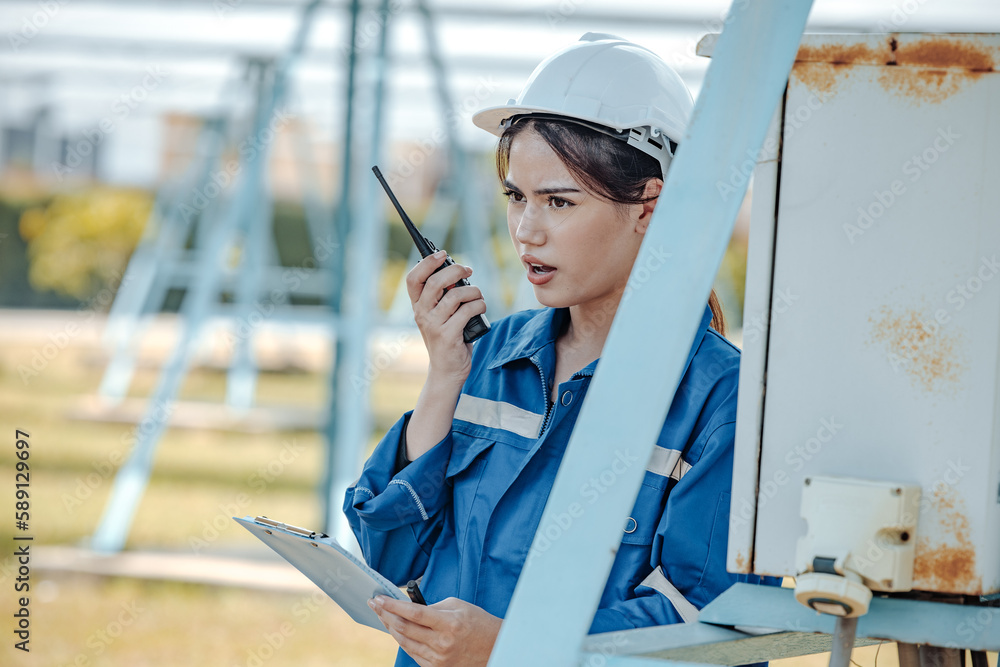 Solar electric installer and practitioner inspect electrical systems ...