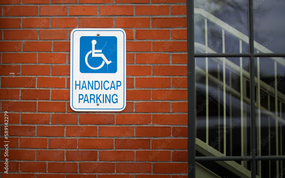 The handicap sign is a blue and white symbol of accessibility. It ...