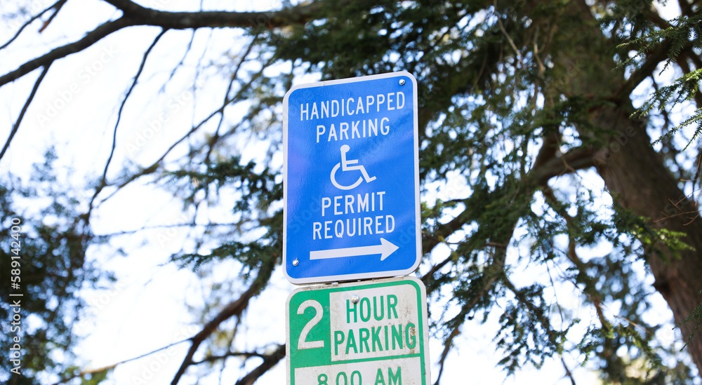 Foto Stock The handicap sign is a blue and white symbol of ...