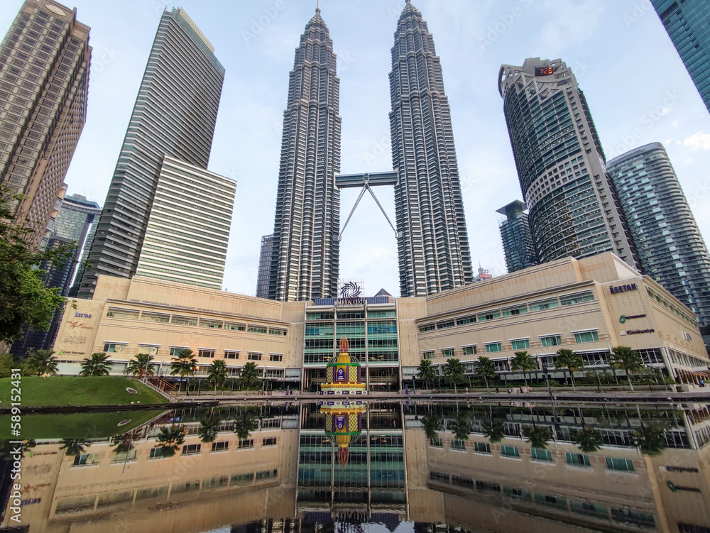 Petronas Twin Towers and KLCC Twin Towers in the city of Kuala Lumpur Stock Photo | Adobe Stock