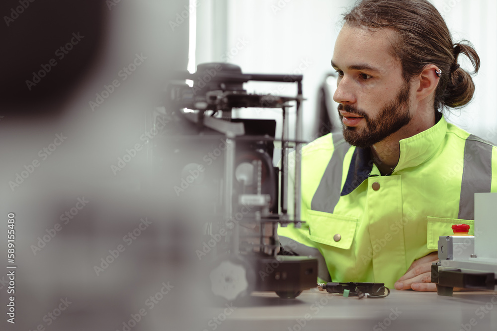Robotic engineer monitoring robot arm connection for maintenance in ...