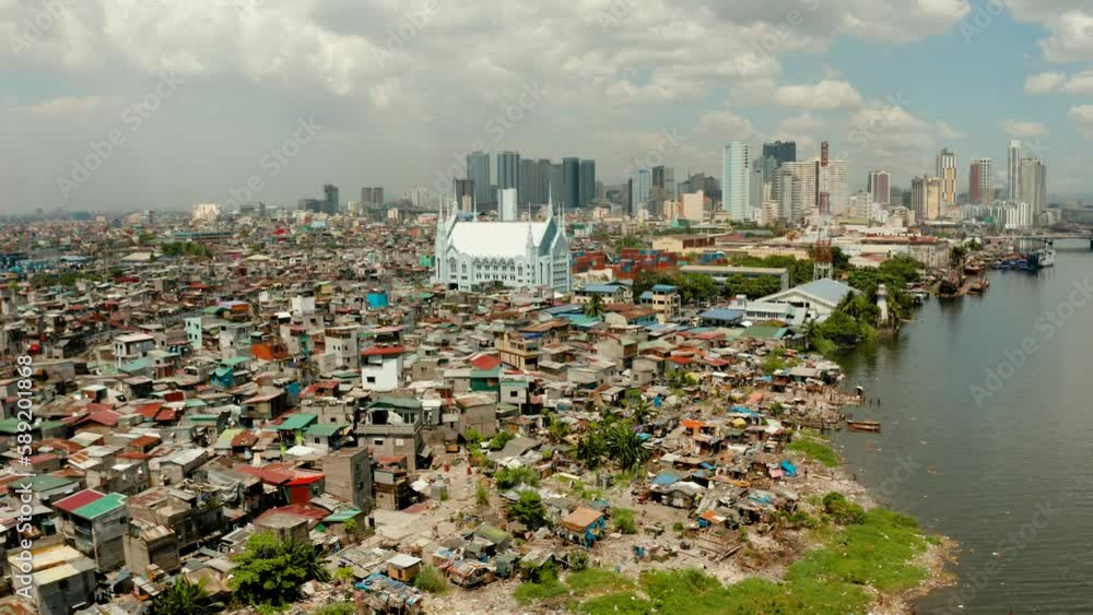 Manila is the capital of the Philippines with slums and poor district ...
