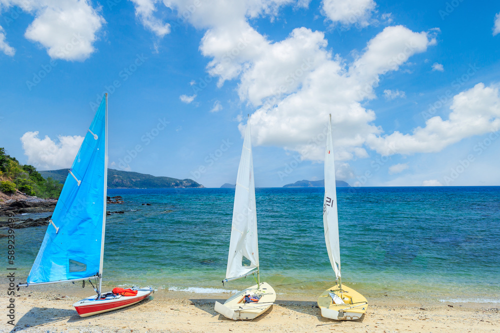 sailboat on the beach,Beautiful sandy beach with palm trees and ...