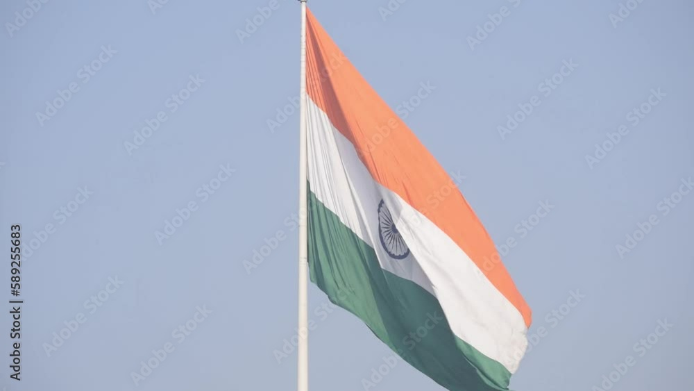 India flag flying high at Connaught Place with pride in blue sky, India ...