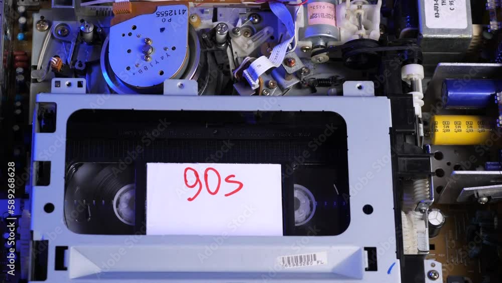 vintage old vhs cassette 90s is inserted into the player Stock ビデオ ...