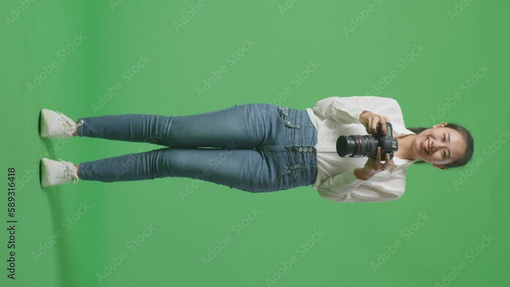 Full Body Of Asian Photographer Using A Camera Taking Picture And ...