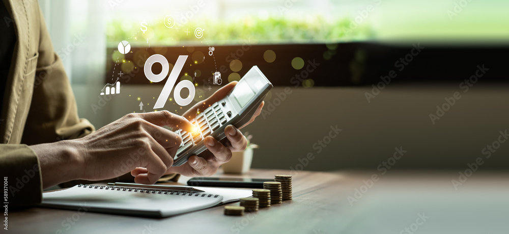 Interest rate and dividend concept, Businessman is calculating income ...