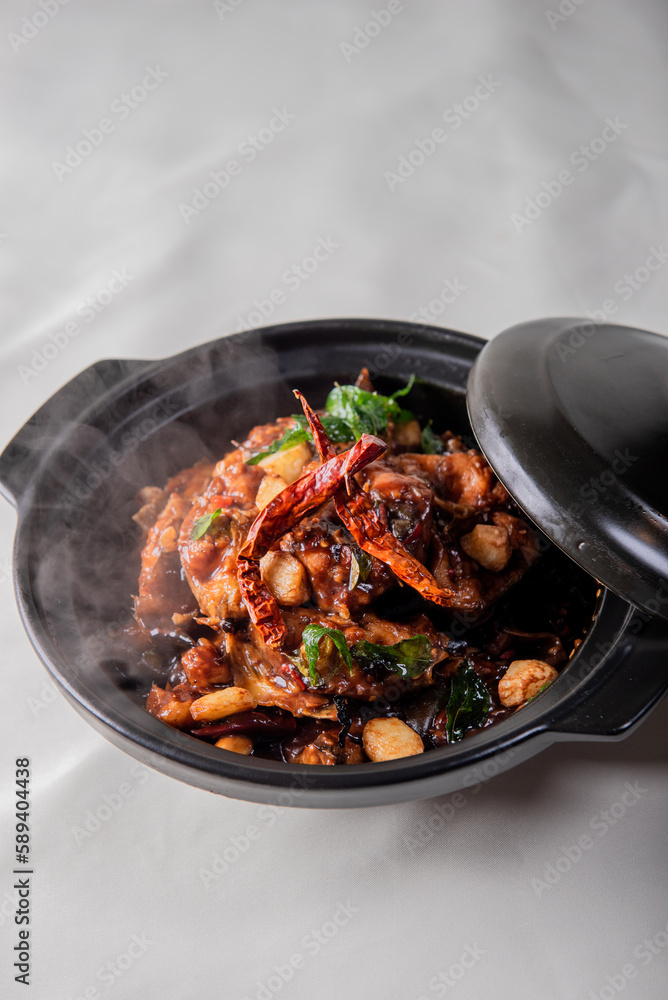 local cook live fresh catfish meat with spicy red dry chili asam sauce ...