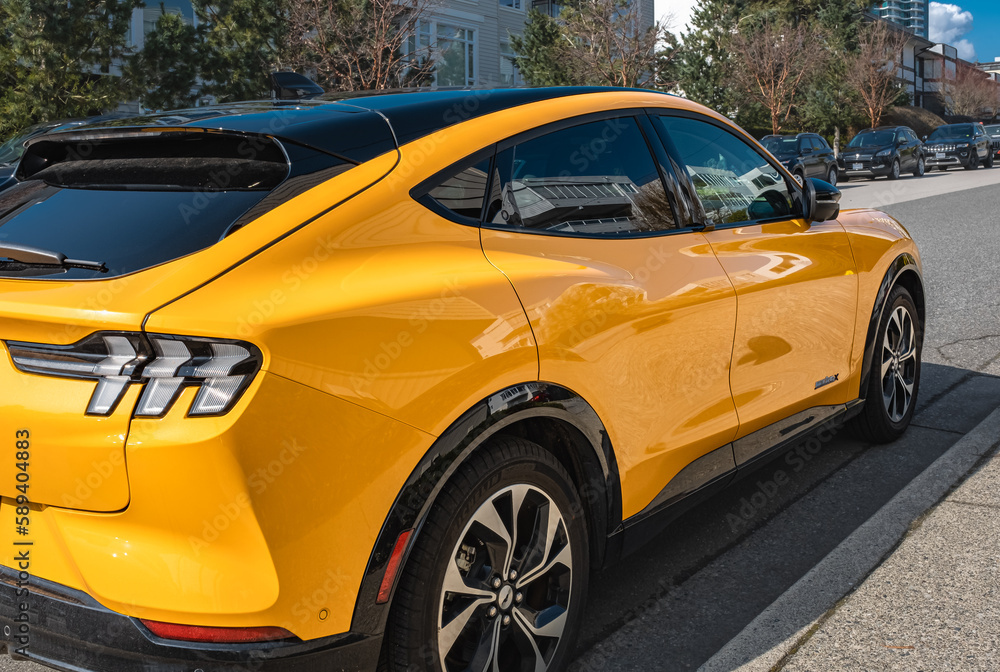 Ford Mustang Mach-E 4X electric SUV car parked on a street. Ford Mustang Mach-E battery electric ...
