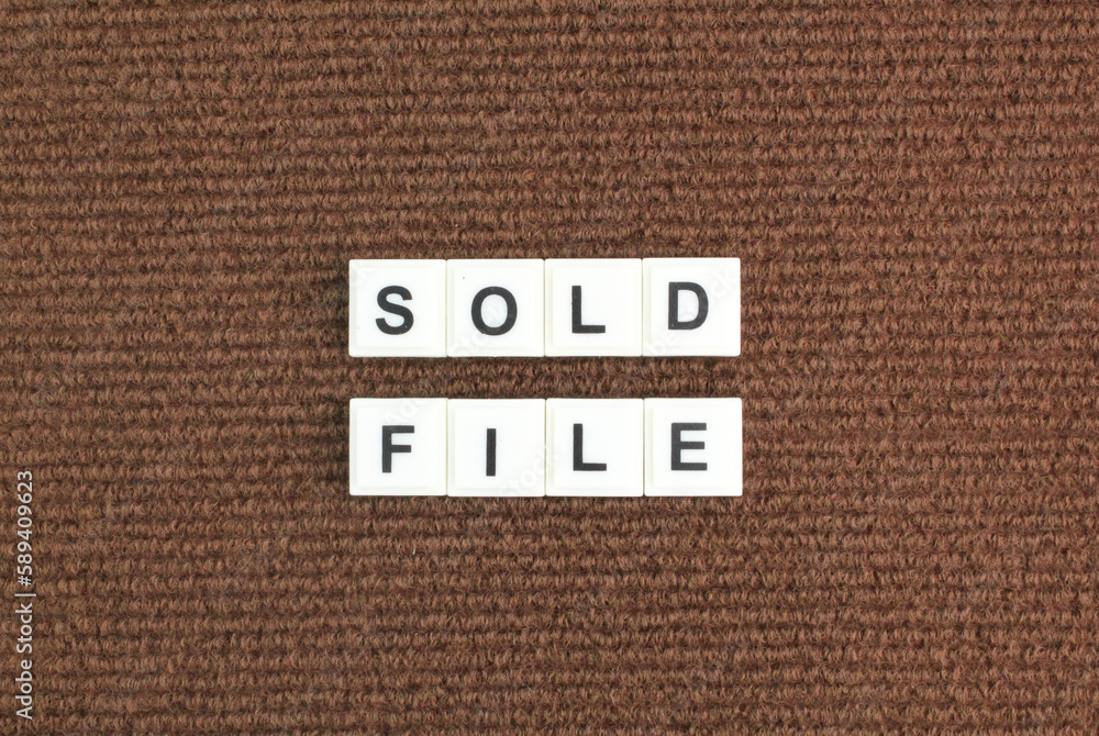 letters of the alphabet with the word sold file. sold file concept ...