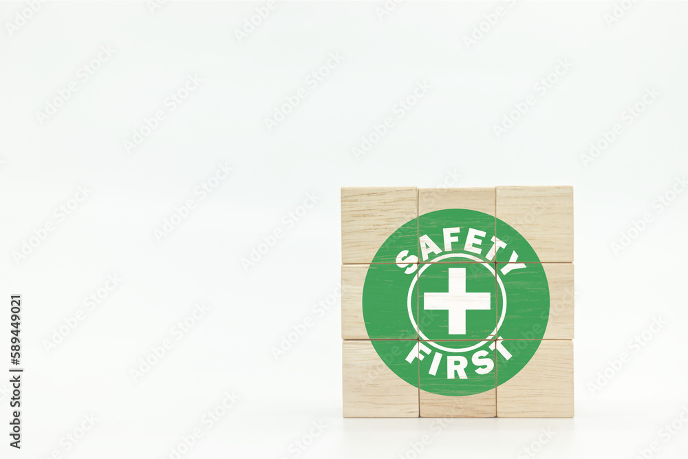 Safety first symbols on wooden cubes with white background. zero ...