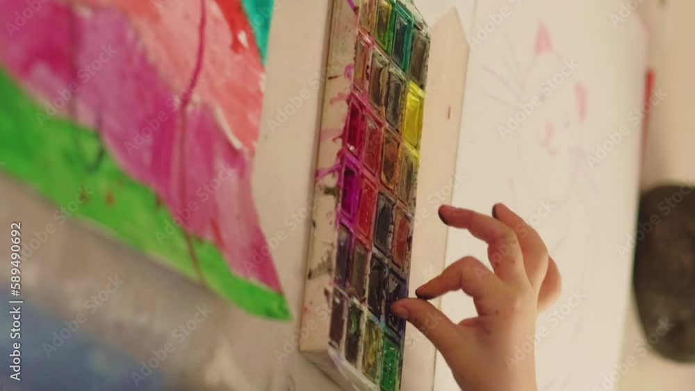 Vertical video. Finger painting. Kid art. Young artist. Child hand ...