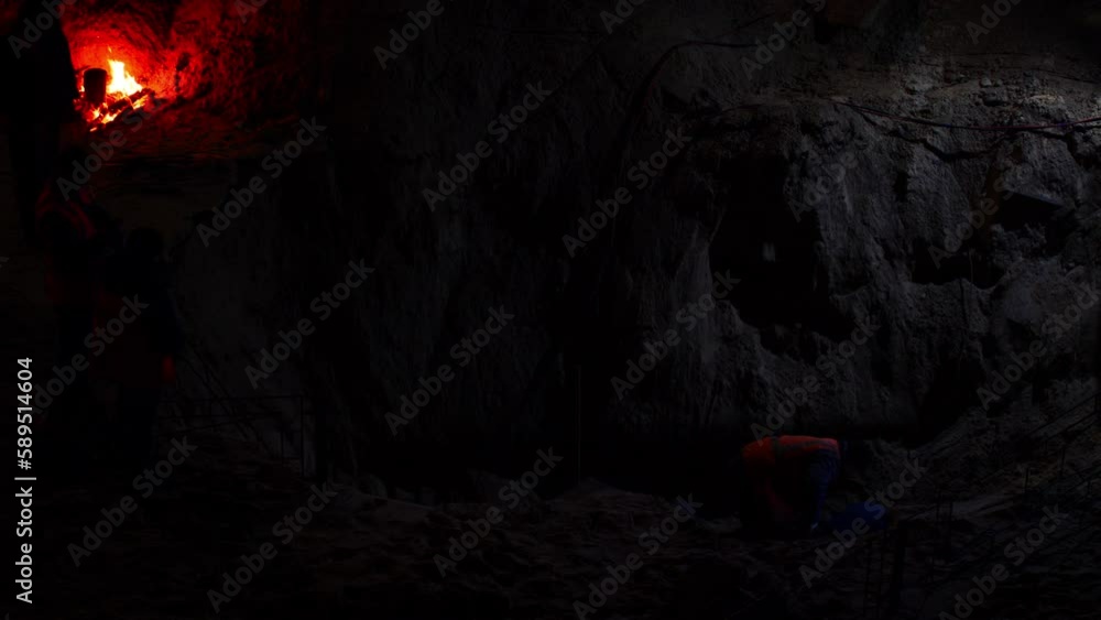 Stockvideon Night excavations in the pit. Archaeologists are excavating ...