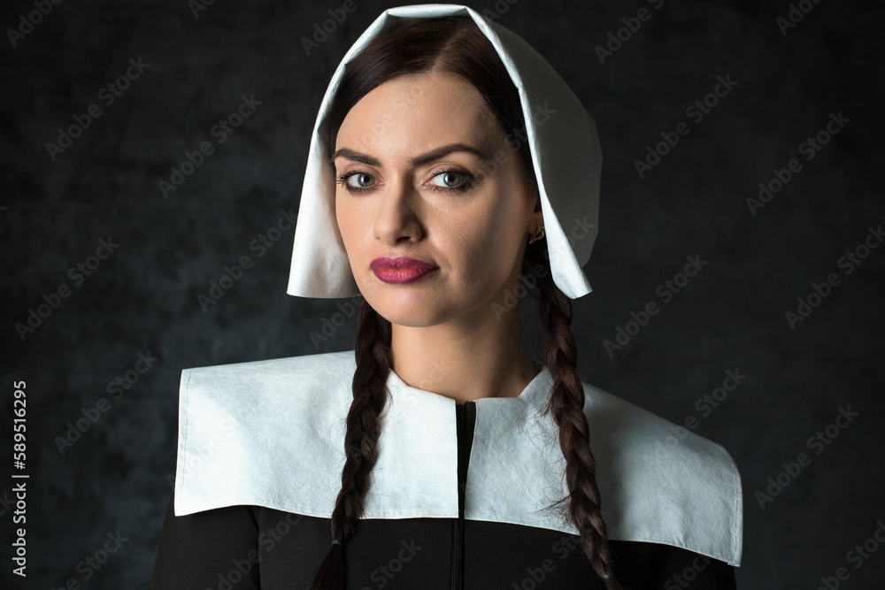 Gothic woman with pigtails in a medieval collar and cap Stock Photo ...