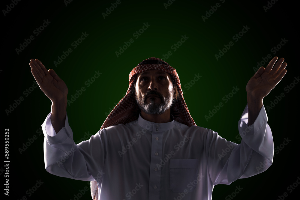 The Muslim raised his hands to the sky. Praising the One God of Allah ...