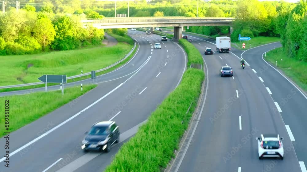 Frankfurt - May 2022: road in europe, green trees and bushes, multi ...