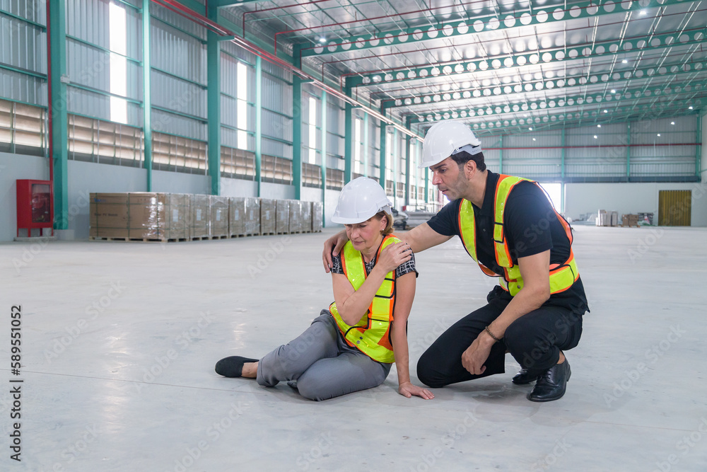 Emergency help engineers provide first aid to construction workers in ...
