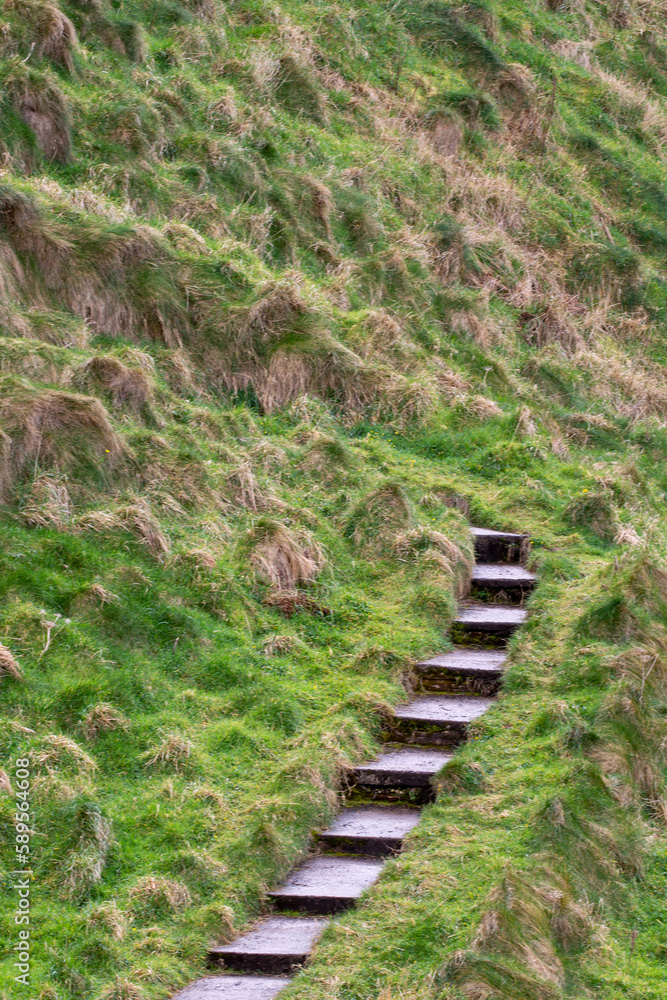 Steps in the steep cliff walk to Kinbane Castle ruins, Ballycastle, UK ...