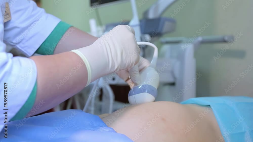 Amniocentesis. Amniotic fluid test. Ultrasound examination of the fetus ...