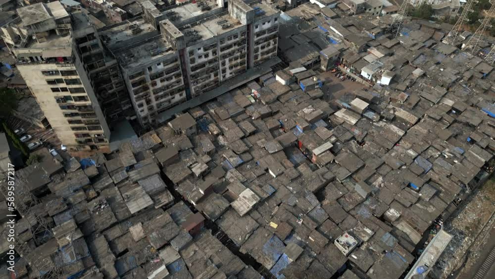 Aerial view flying over the Dharavi slums in Mumbai, Maharashtra, India. Dharavi is considered ...