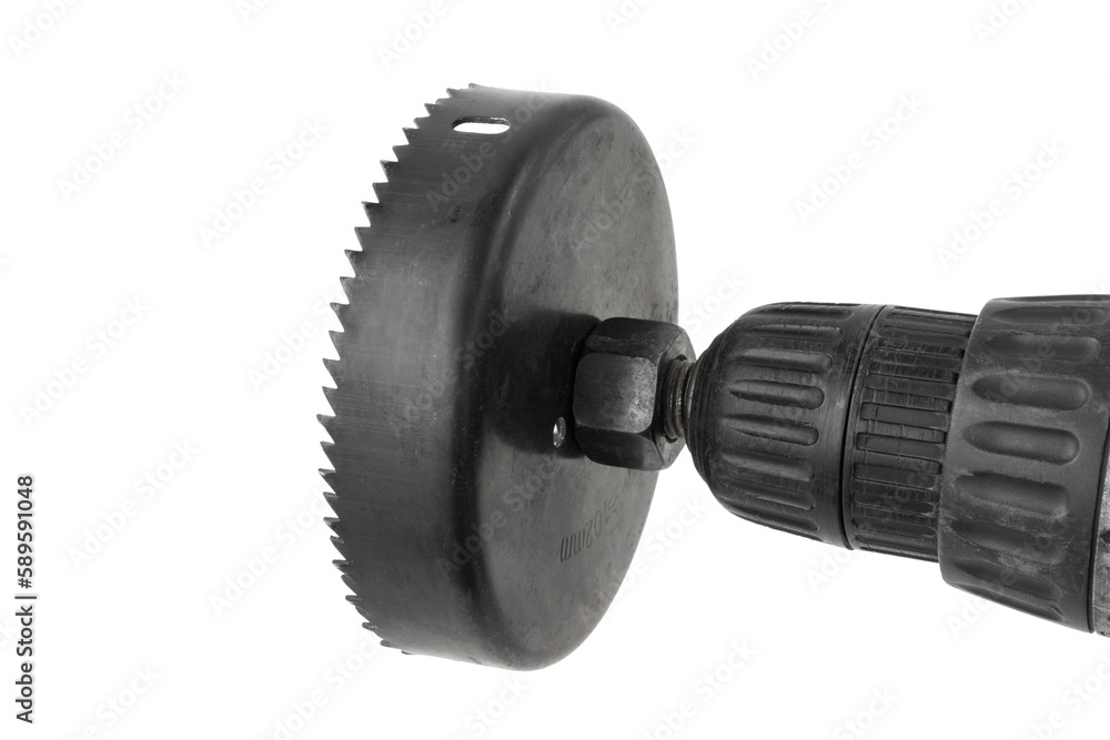 hole saw with attachment on an electric screwdriver, for drilling round ...
