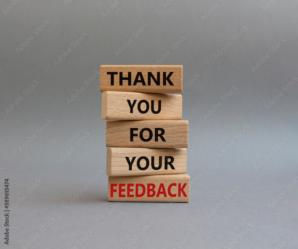 Feedback symbol. Wooden blocks with words Thank you for your Feedback ...