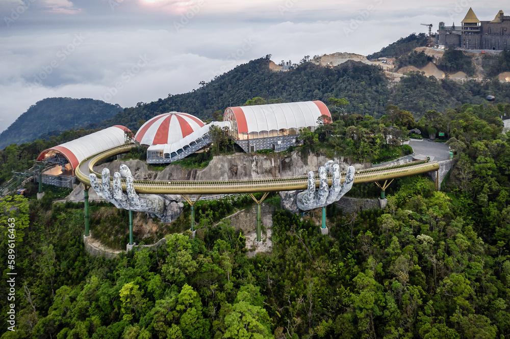Da Nang, Vietnam 2021 Aerial view of the Golden Bridge is lifted by two ...