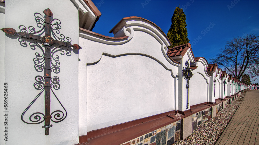 Columbarium built into the wall surrounding the cemetery of Saint Roch ...