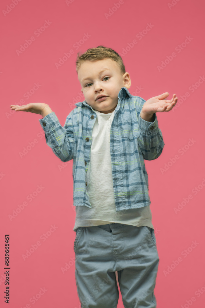 Sorry dont know. Portrait of handsome kid boy, shrugging, cant tell ...