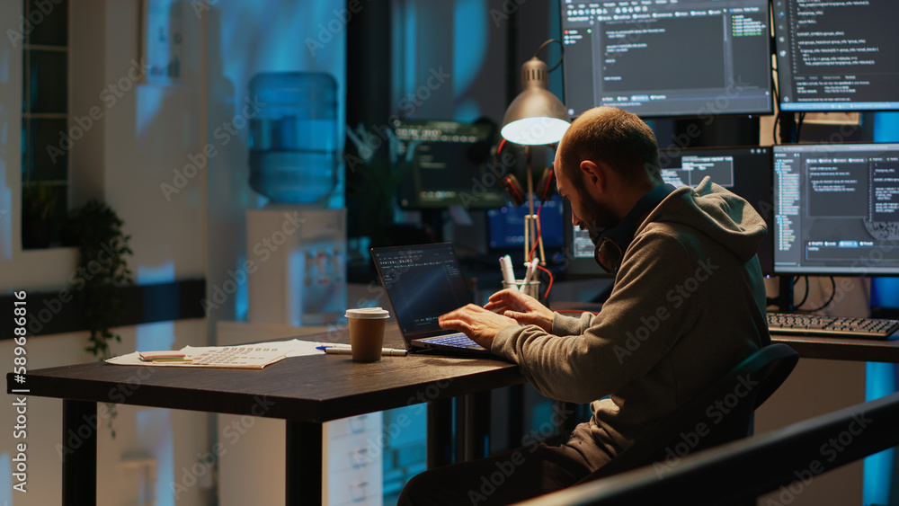 Database Programmer Typing Server Code On Multiple Screens Using Coding Language On Laptop Late