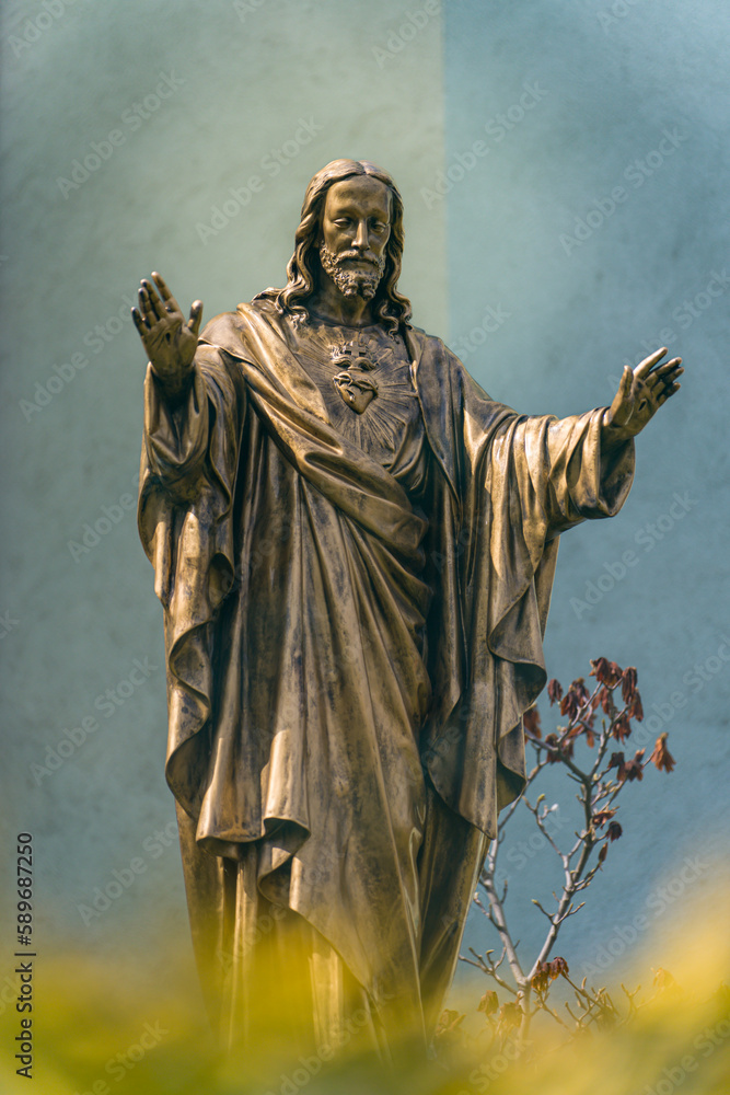The figure of Jesus Christ, the Heart of Jesus on the corner of ...
