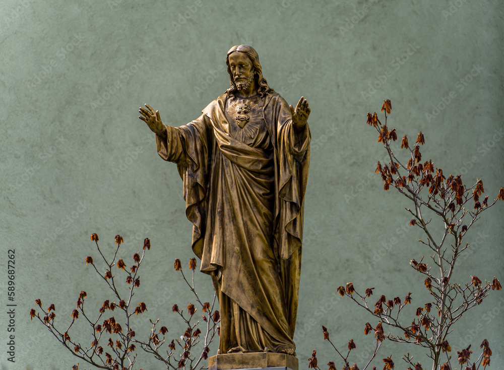 The figure of Jesus Christ, the Heart of Jesus on the corner of ...