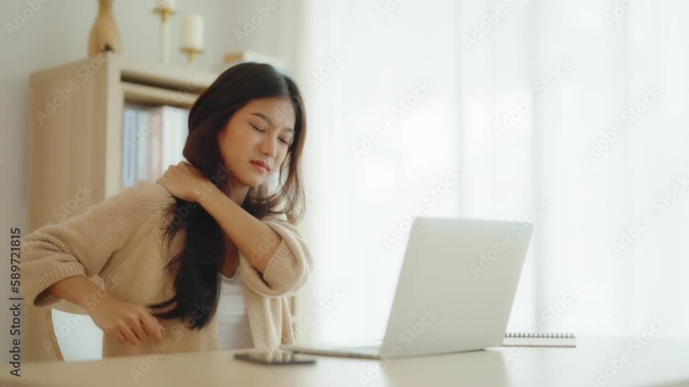Office syndrome concept. Young asian woman feeling pain in neck and ...