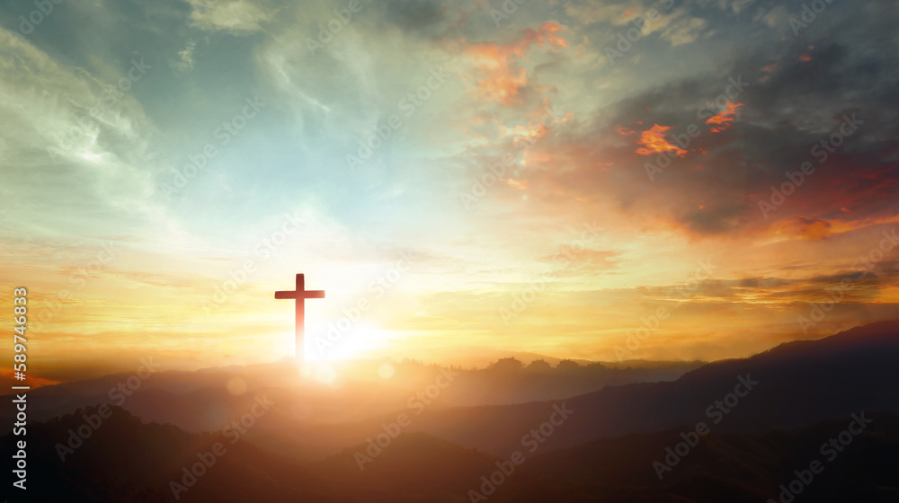 The crucifix symbol of Jesus on the mountain sunset sky background ...