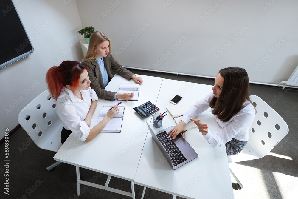 This picture depicts three colleagues who value trust, respect, and ...