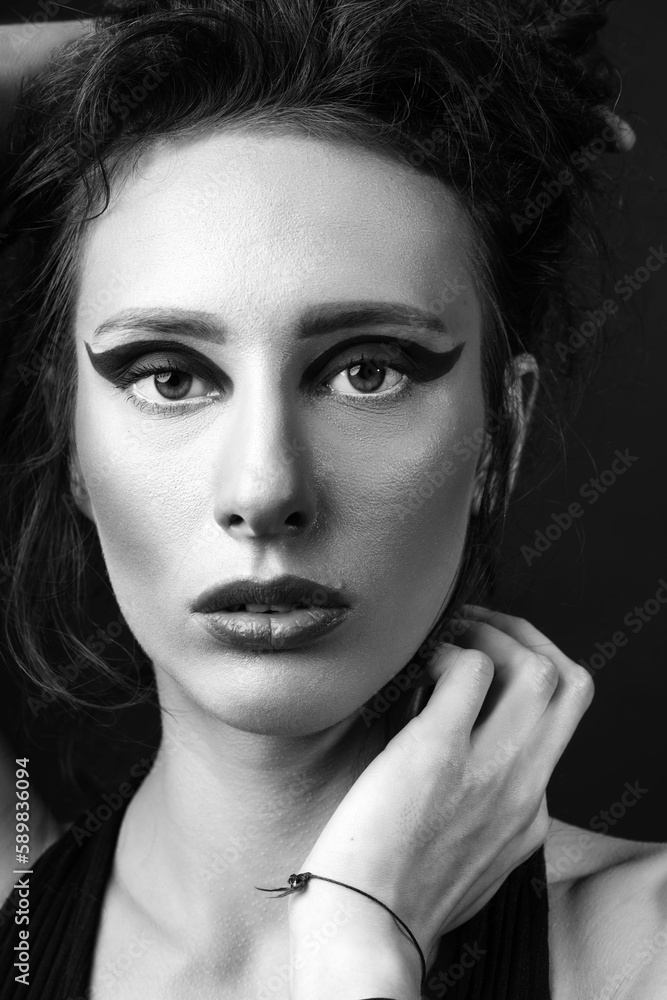 Fashion and make-up concept. Studio portrait of beautiful woman with ...