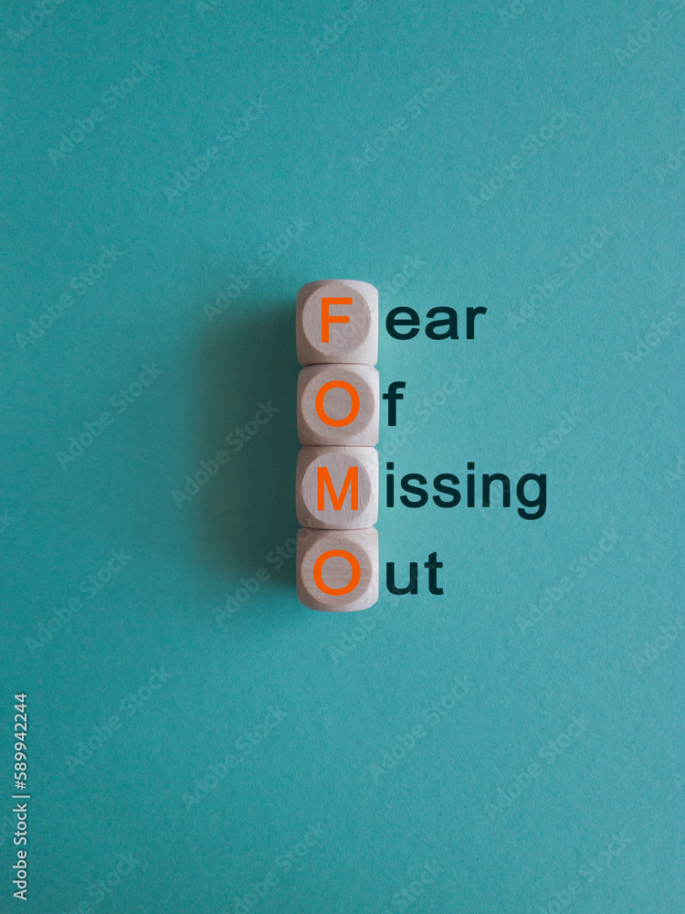 FOMO fear of missing out symbol. Concept words FOMO fear of missing out ...