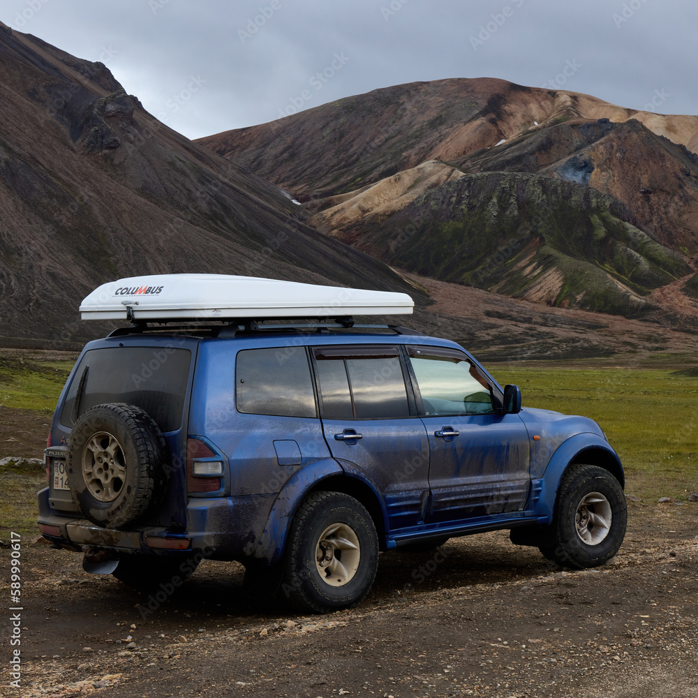 Mitsubishi Pajerio with a roof tent on the route in the LANDMANNALAUGAR ...