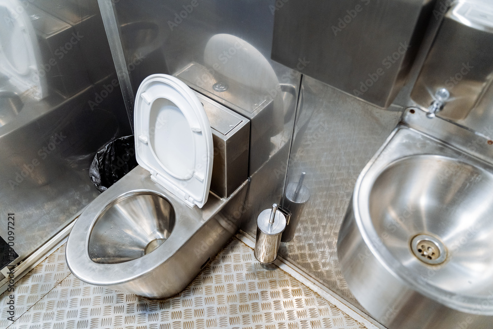 Iron toilet in the toilet on the street, a room for a urinal, a toilet ...