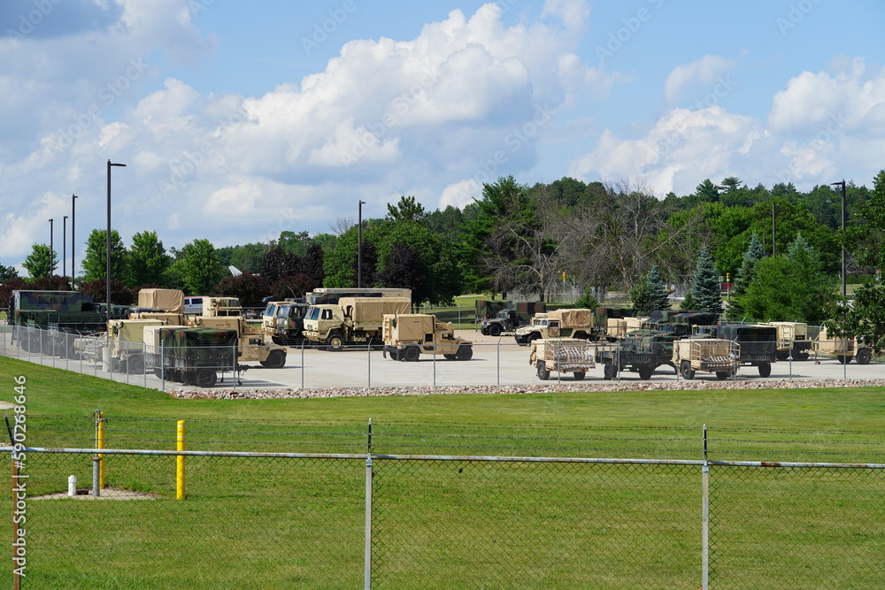 Foto de Military vehicles parked at Volk Field Air National Guard Base ...