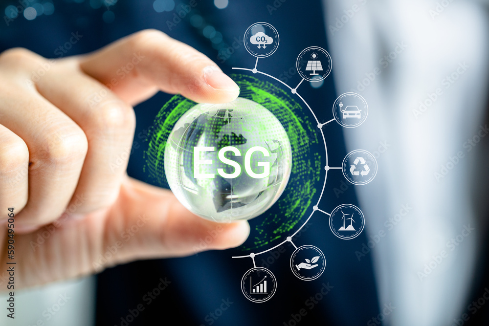 Businesswomen holding crystal globe with ESG icon concept for ...