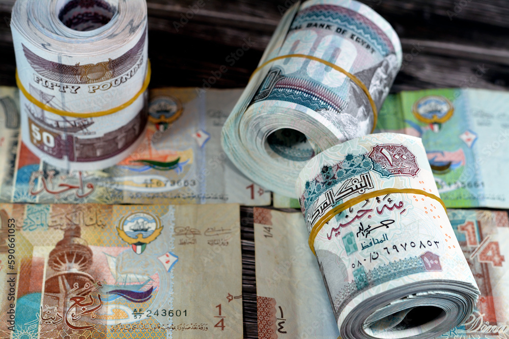 Rolls of Egypt money banknote bills of 100 and 50 EGP LE one hundred ...