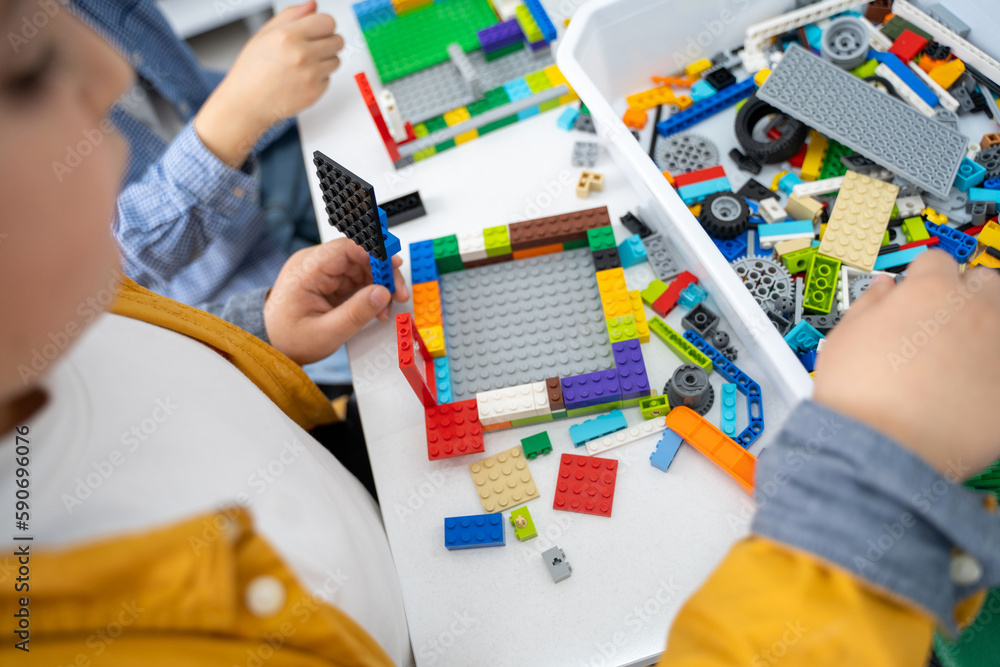 Robotics programming class. Children construct and code Robot. STEM ... Robotics programming class. Children construct and code Robot. STEM ...