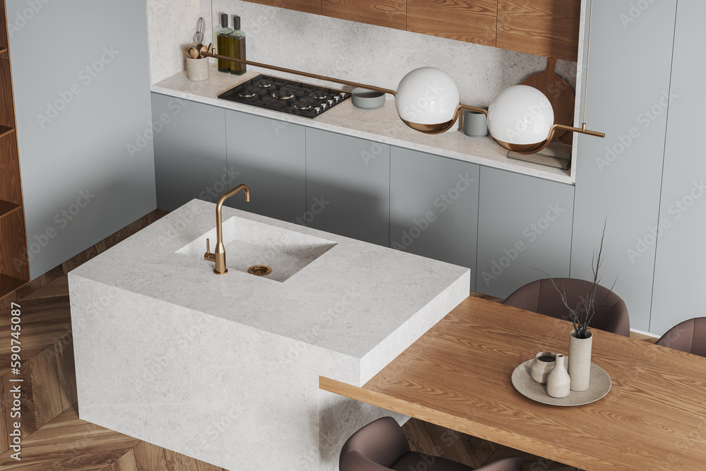 Top view of modern home kitchen interior with cooking zone and dinner ...