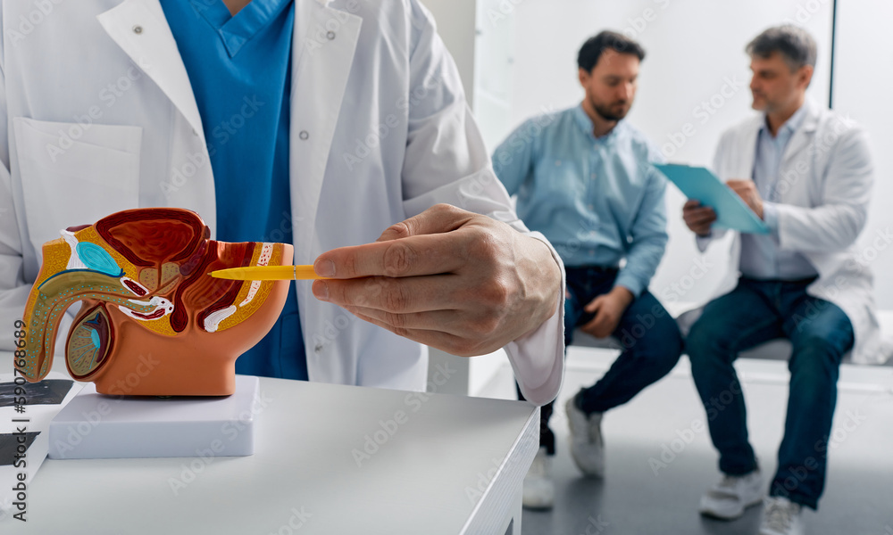 Prostate cancer treatment. Doctor consulting male patient with ...