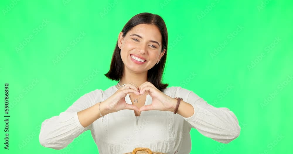 Heart, hands and face of woman smile on green screen, studio or happy ...