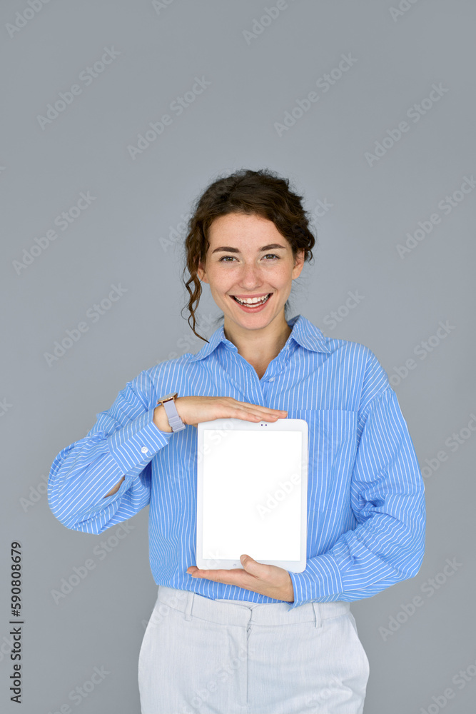 Young smiling business woman model holding digital tablet computer ...