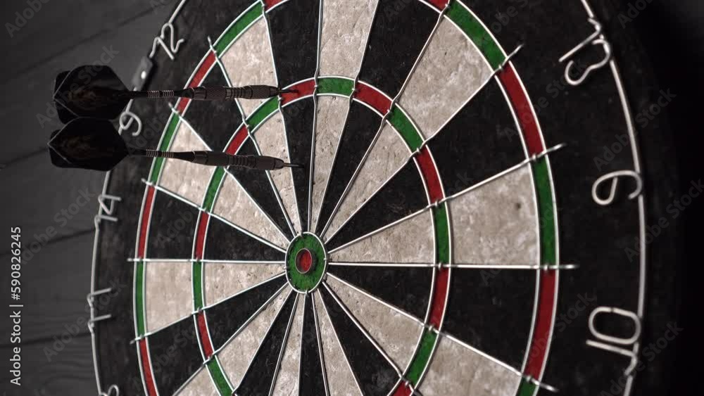 Three darts hit the dartboard. Unlucky - none of the darts hit the bull ...